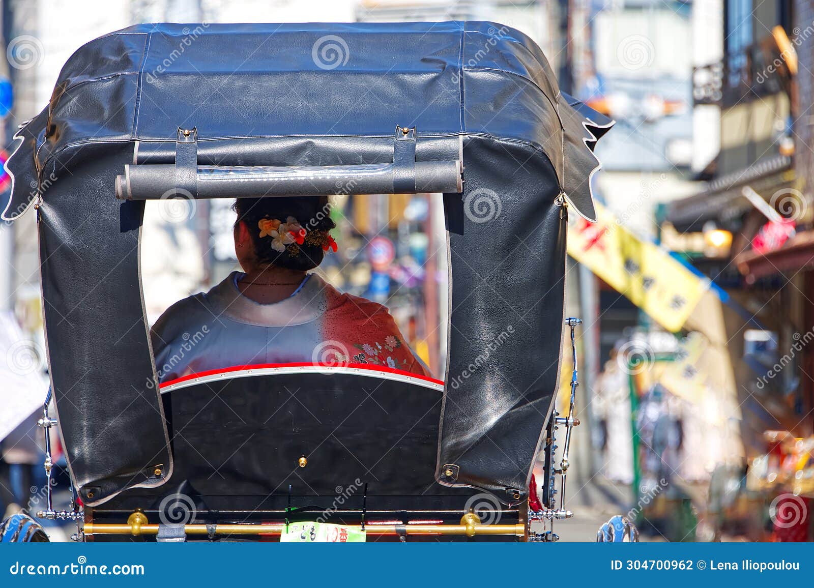Part Rear View of a Pulled Rickshaw with a Woman Inside Stock Photo ...