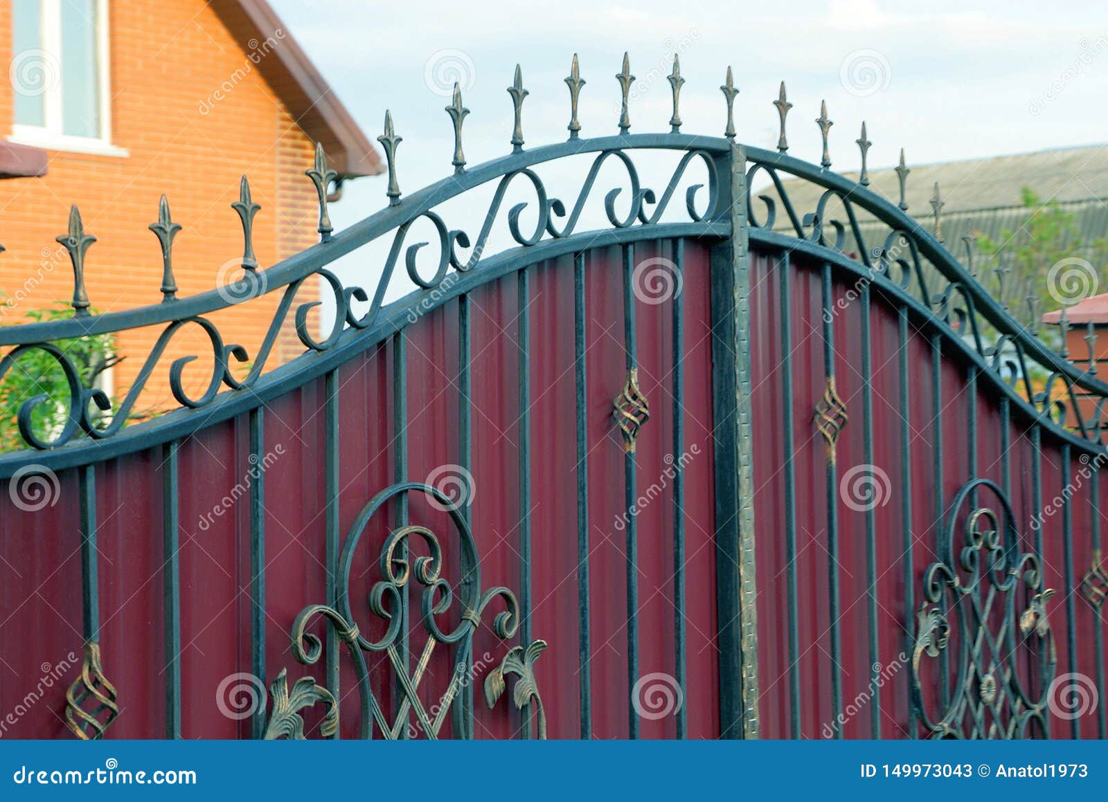 Part of a Red Metal Gate with a Black Forged Pattern Stock Image ...