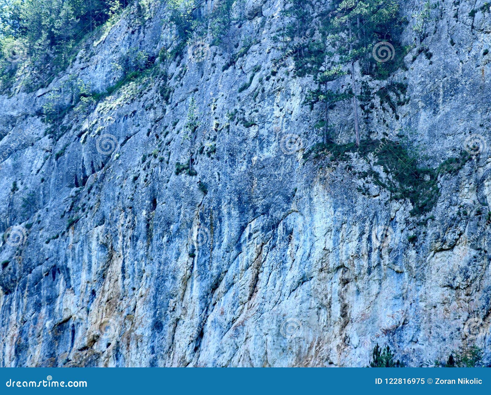 Blue Rocky Side of the Mountain Stock Image - Image of mineral ...