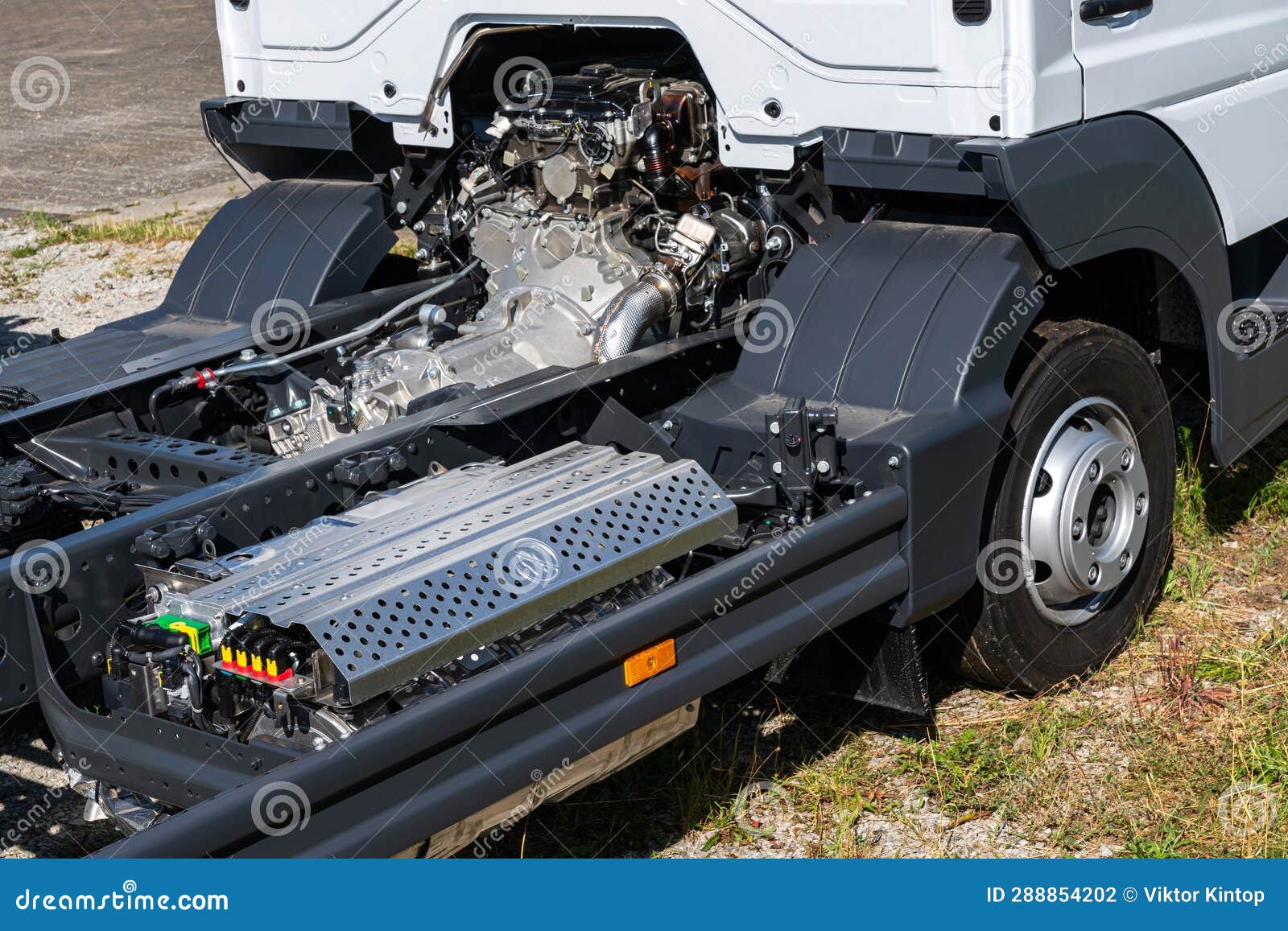 Part Of Big Rig Semi Truck With Grille And Headlight On The Truck Stop ...