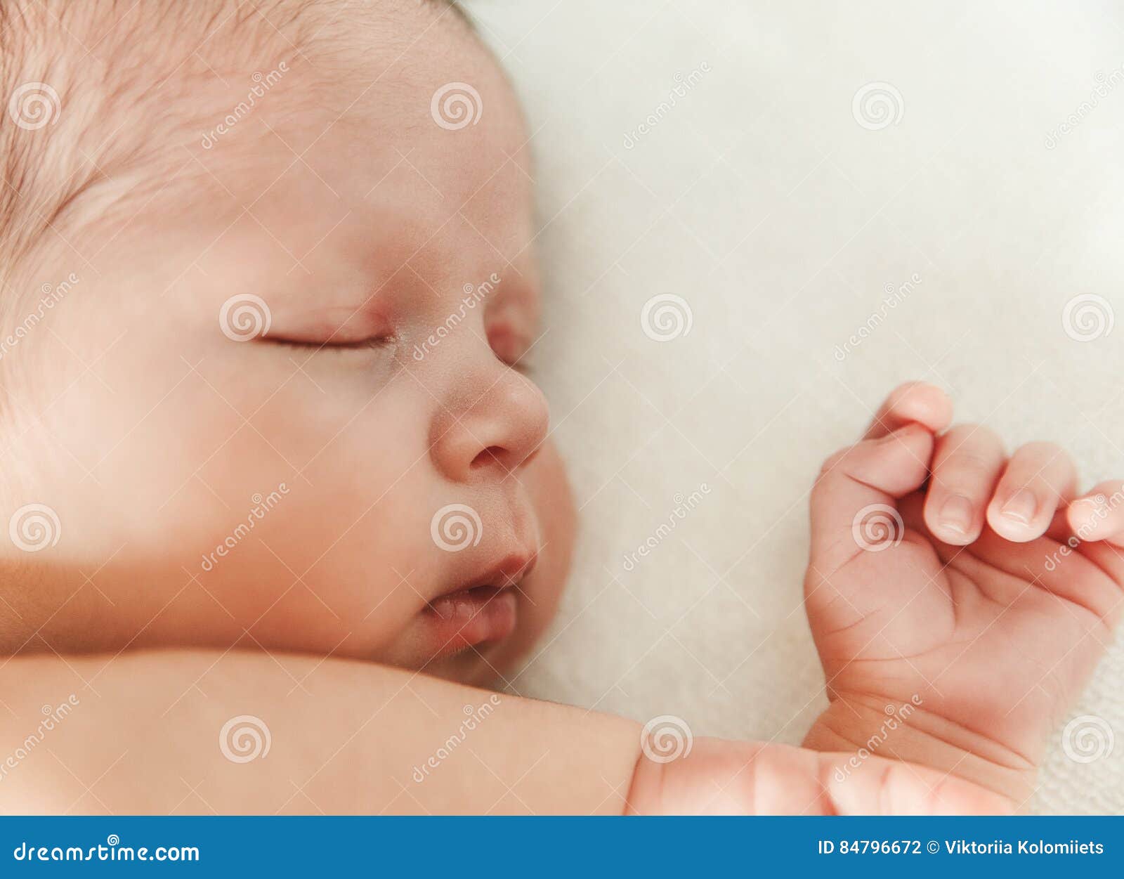 The Part of Soft Face Newborn Baby with Small Touching Hand.Selective ...