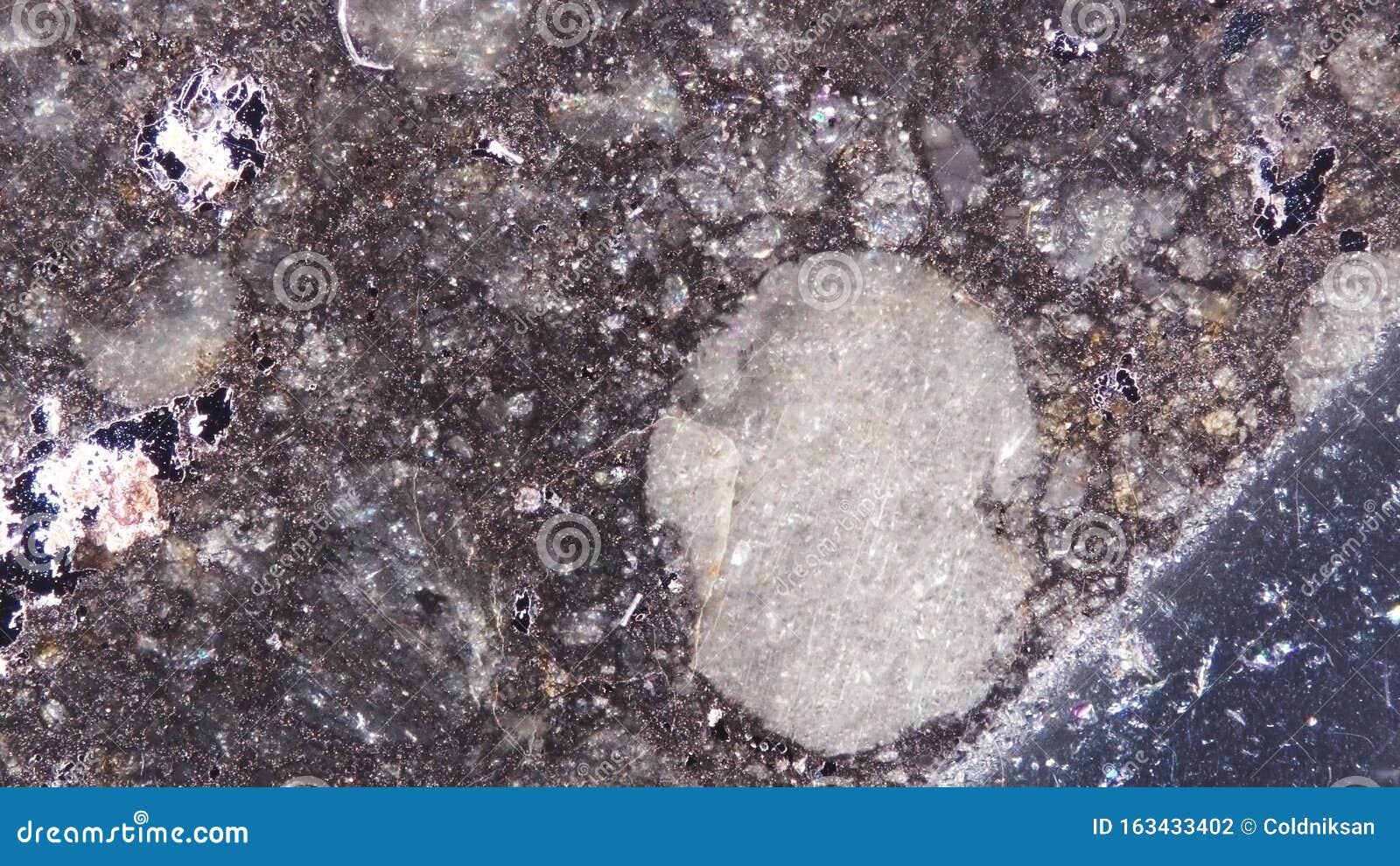 Part of a Space Meteorite Under a Microscope Closeup Stock Photo ...
