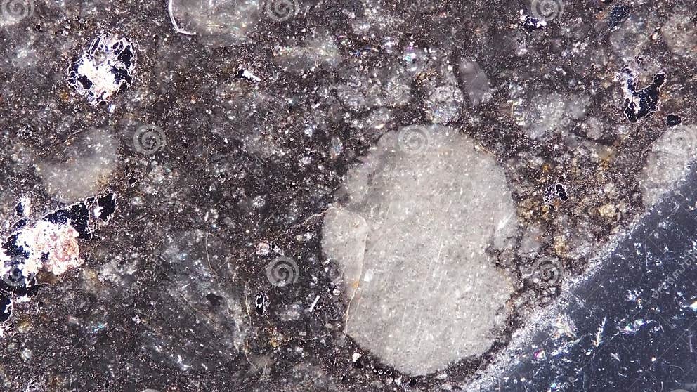 Part of a Space Meteorite Under a Microscope Closeup Stock Photo ...