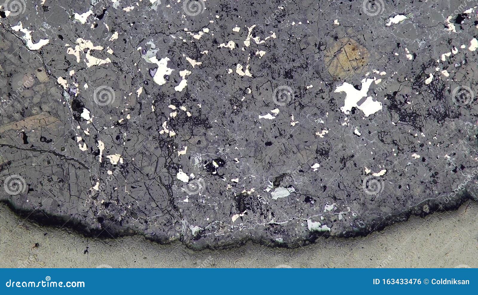 Part of a Space Meteorite Under a Microscope Closeup Stock Photo ...