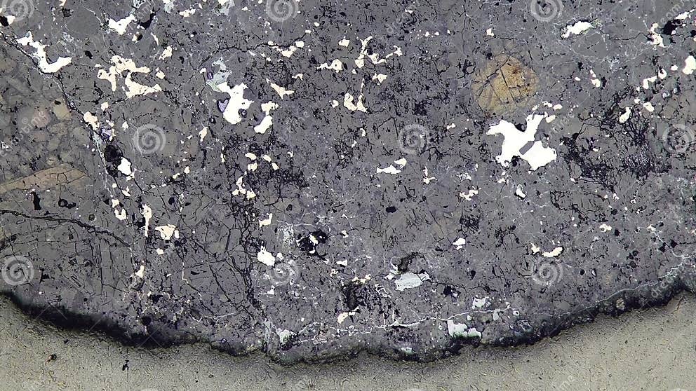 Part of a Space Meteorite Under a Microscope Closeup Stock Photo ...