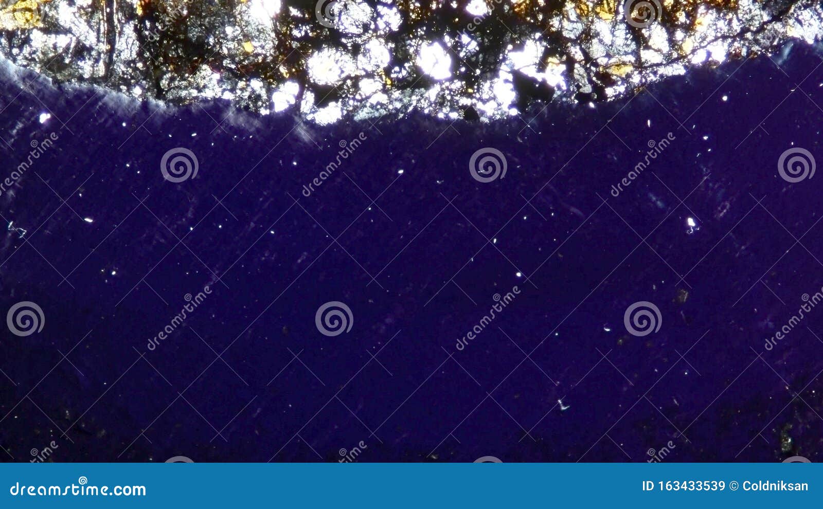 Part of a Space Meteorite Under a Microscope Closeup Stock Image ...