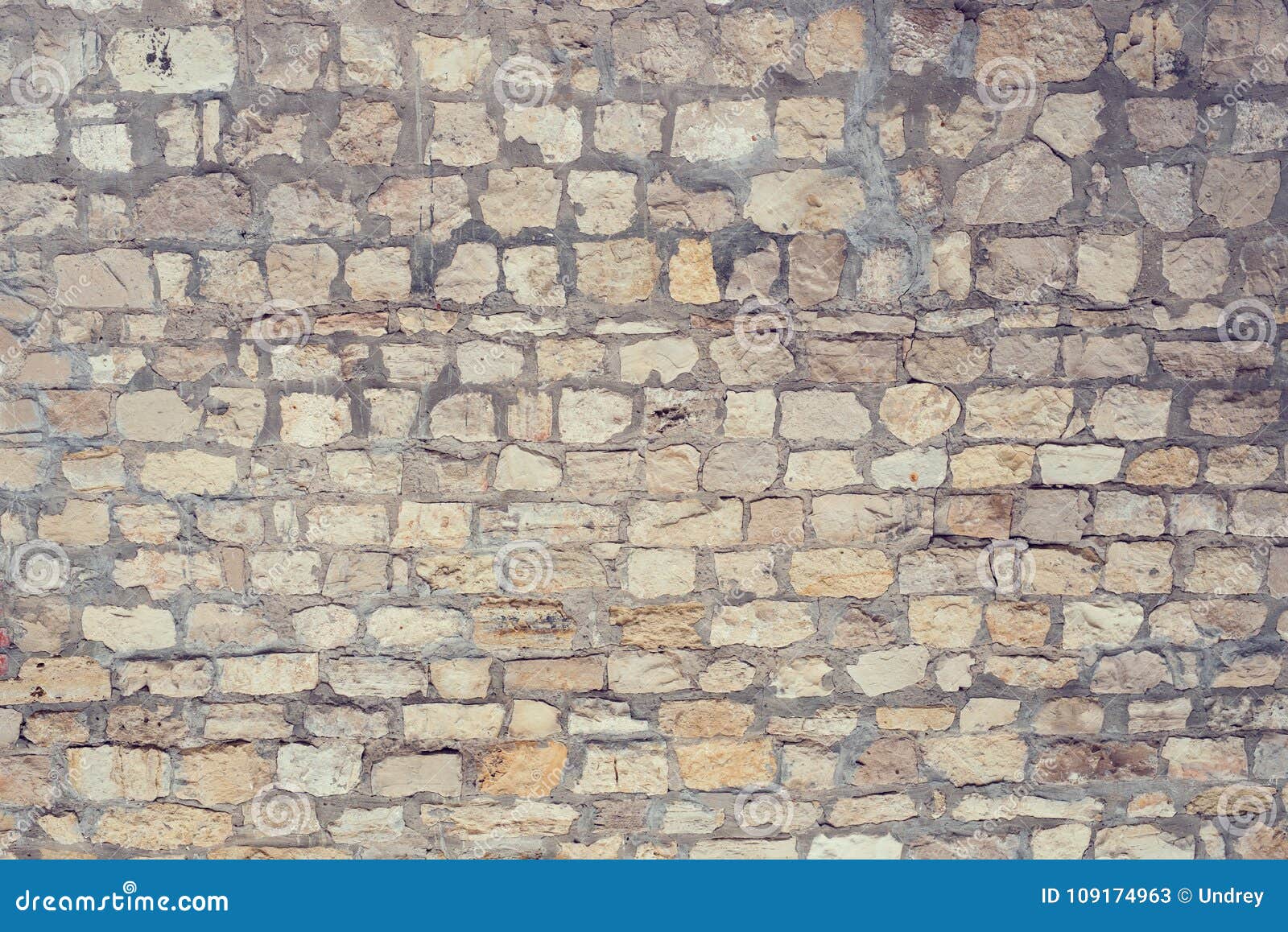 Part of a Uneven Stone Wall with Cement Background, Texture Stock Image ...