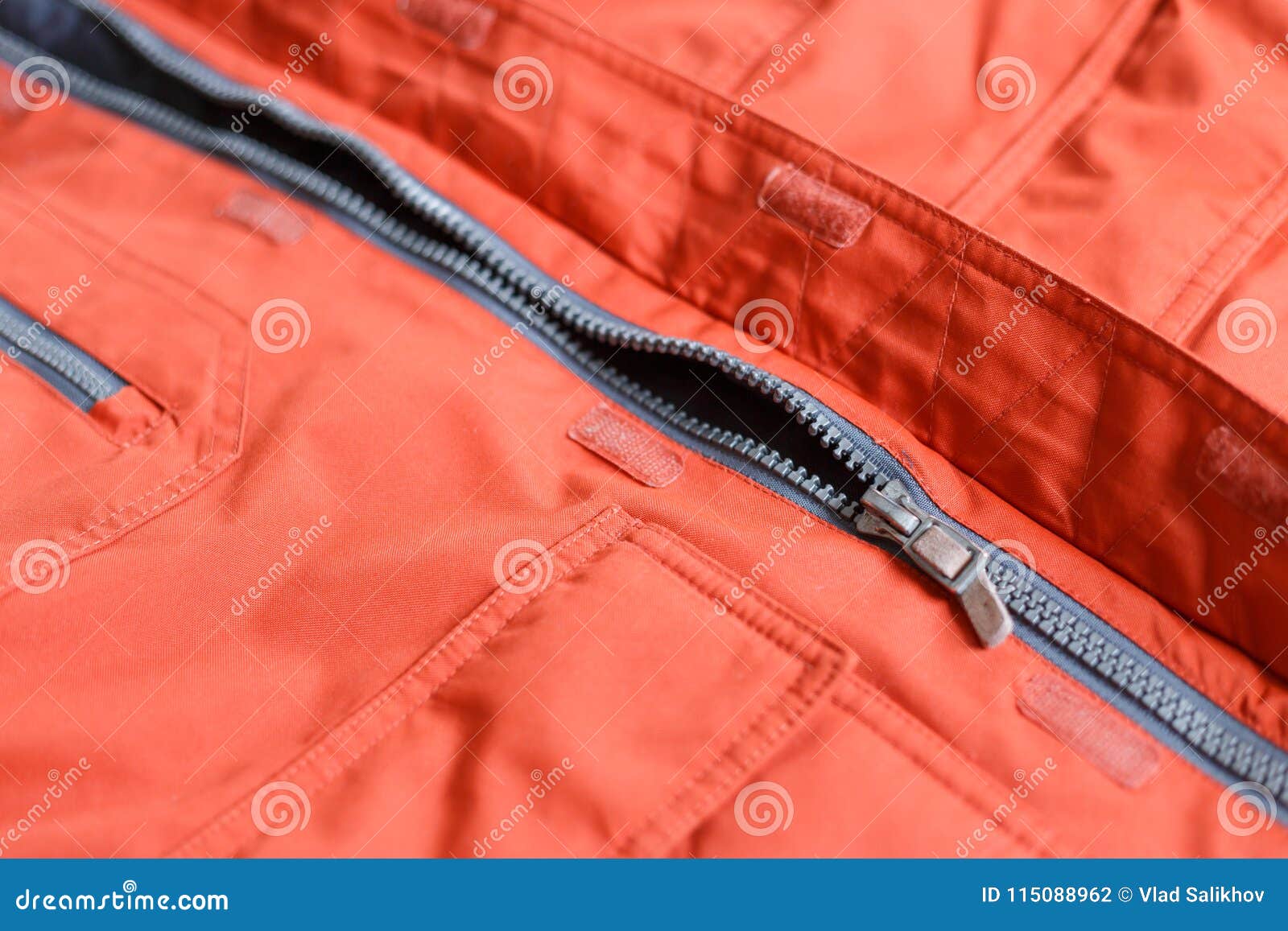 Part of a Zipper with a Lock on Red Cloth Stock Photo - Image of ...
