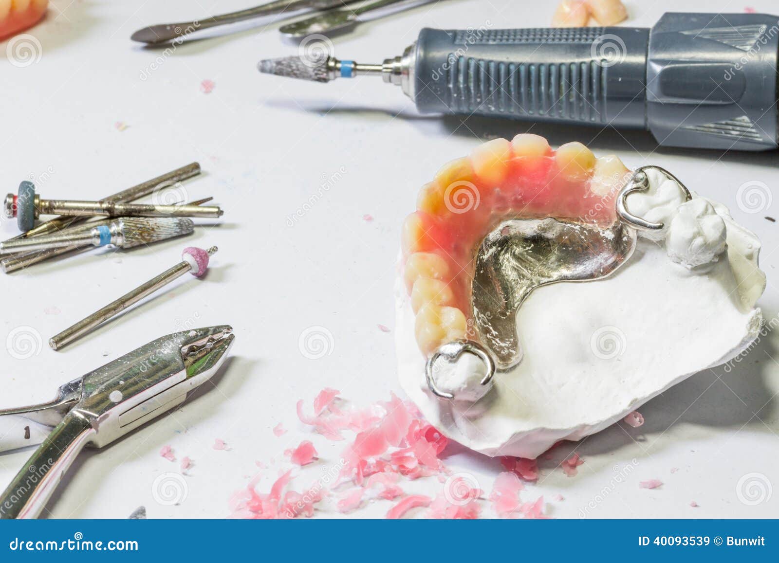 Partial Denture with Tool on Table of Dental Technician Workplace ...