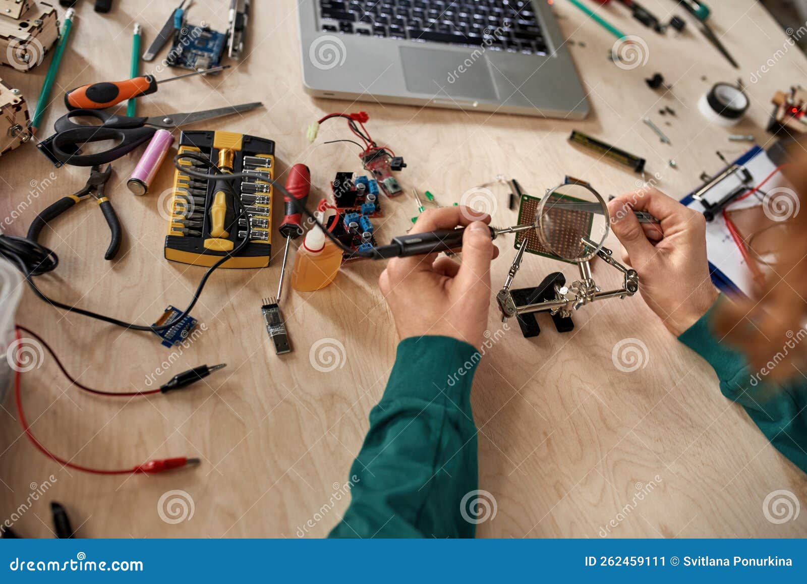 Partial Male Engineer Soldering Microchip at Table Stock Image - Image ...