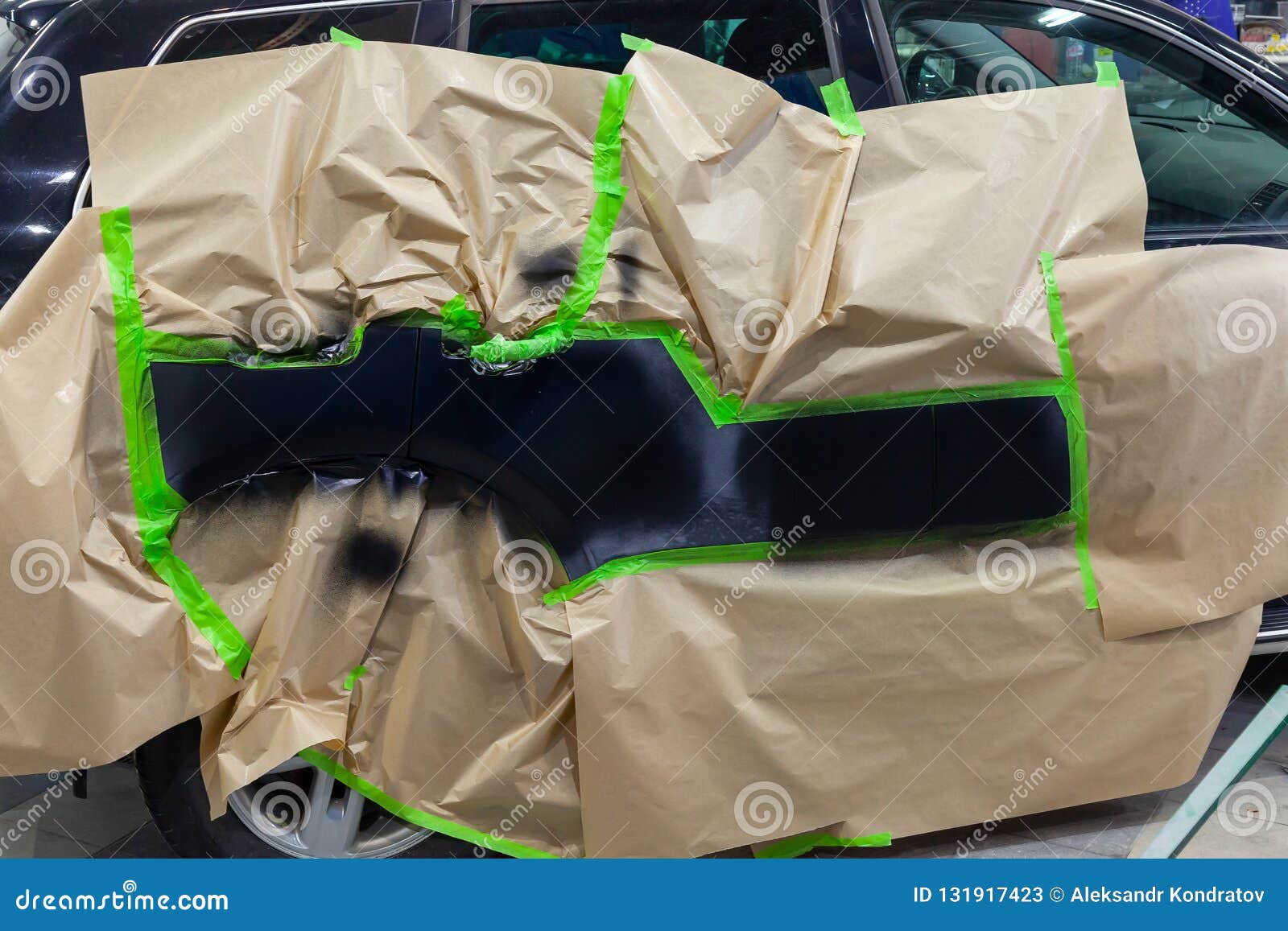 Partial Painting of the Side Elements of the Body of a Black SUV Stock ...