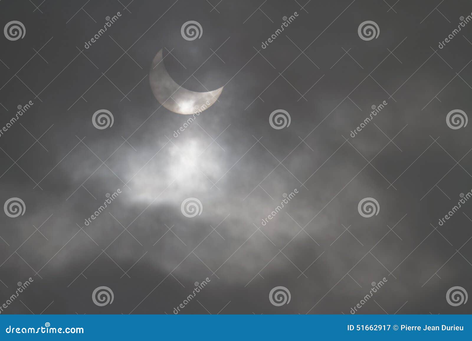 Partial Solar Eclipse Seen through the Clouds Editorial Photography ...