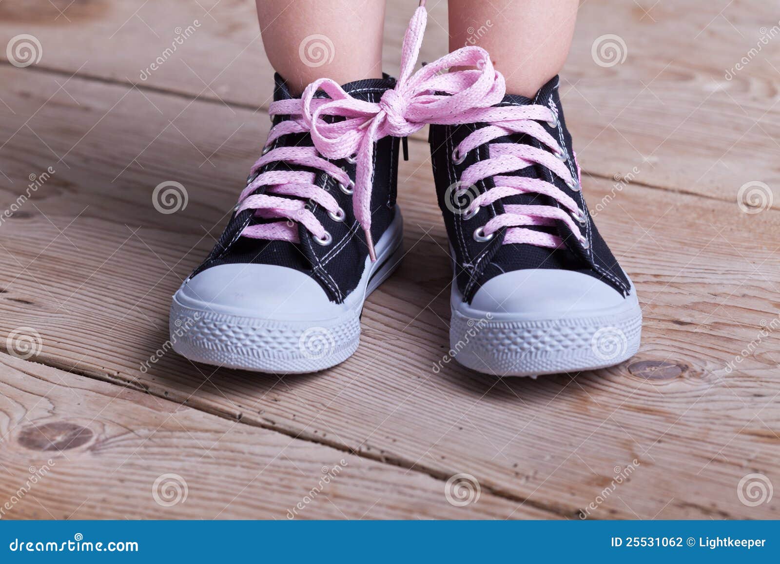 Partial Success - Child with Two Shoes Tied Stock Photo - Image of ...