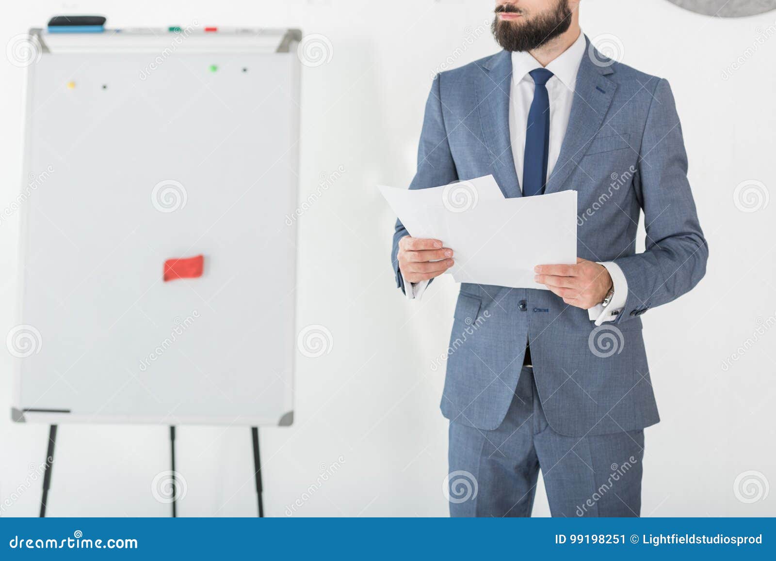Businessman Holding Papers in Hands in Office Stock Image - Image of ... Businessman Holding Papers in Hands in Office Stock Image - Image of ...