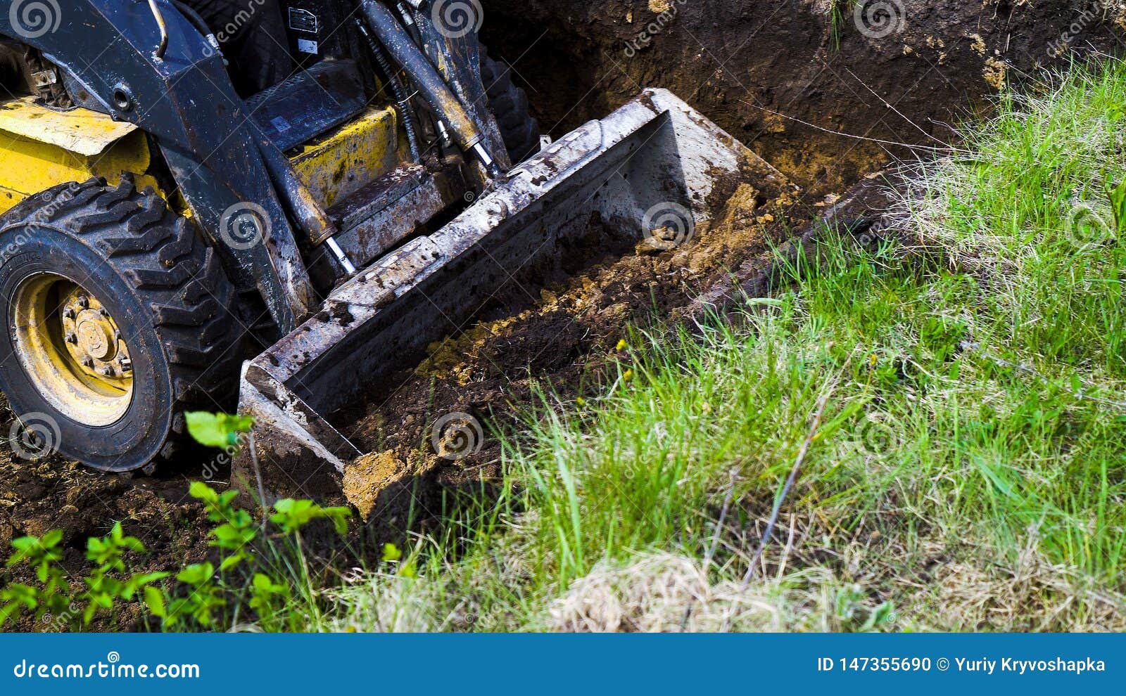 Partial View of Dirty Mini Loader Digging Pit during Earth Works Stock ...