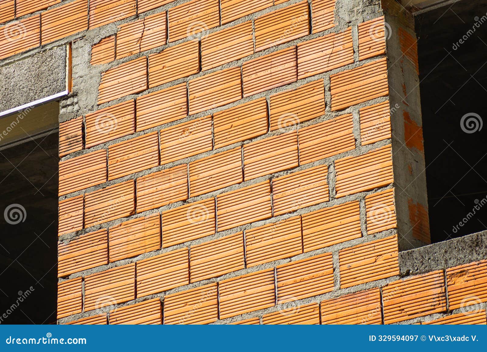 Partial View of the Facade of a Brick and Cement Building Under ...