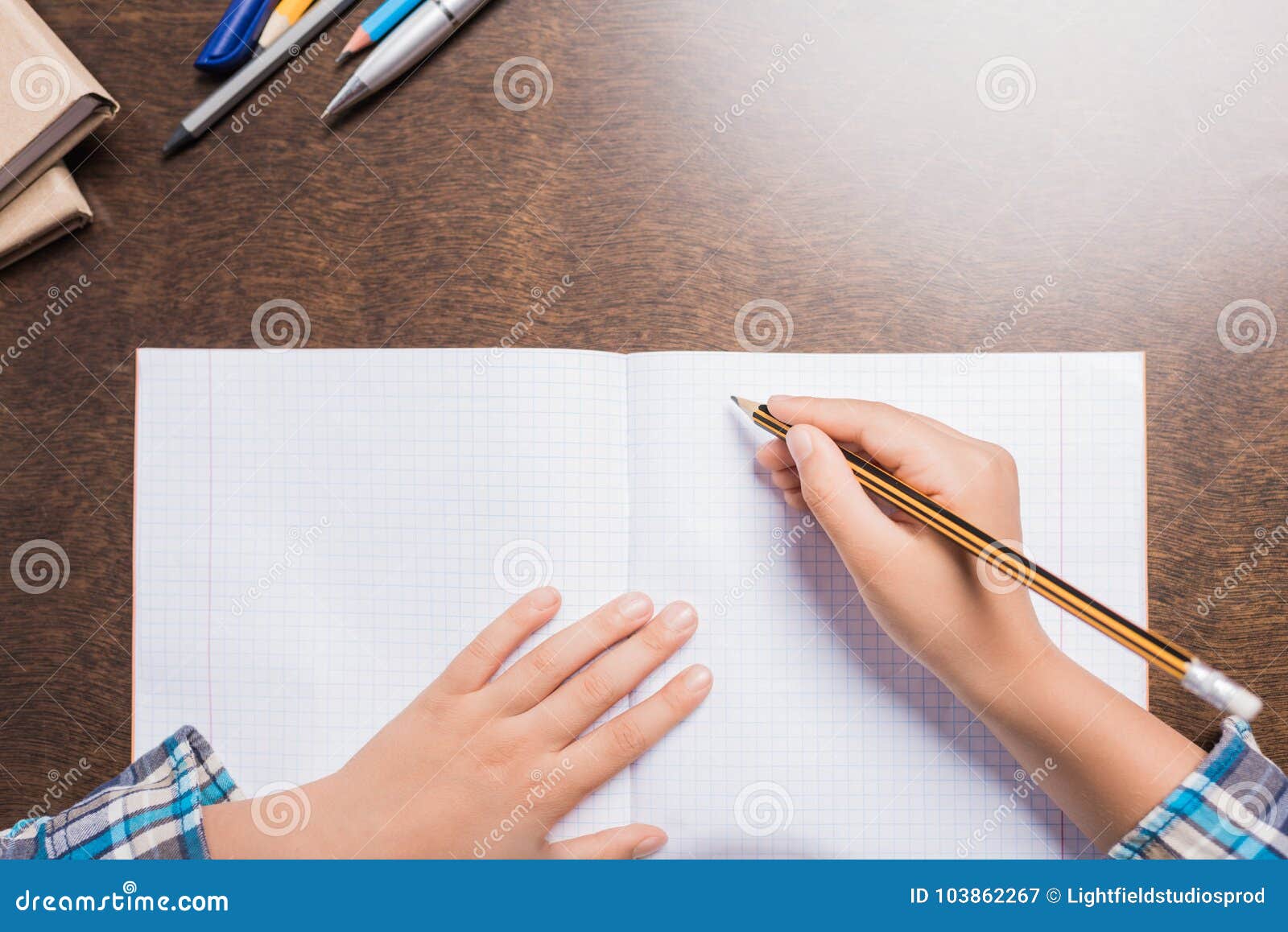 Kid writing in notebook stock image. Image of childhood - 103862267
