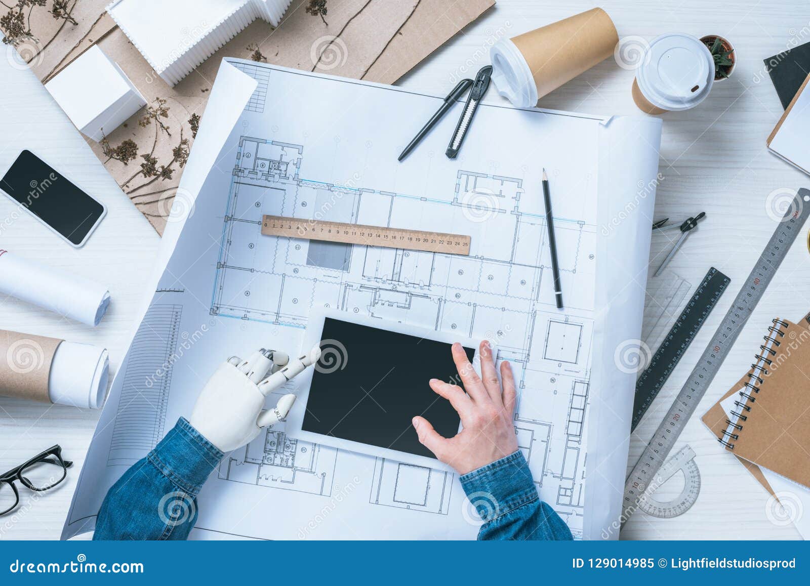 Partial View of Male Architect with Prosthetic Arm Using Digital Tablet ...