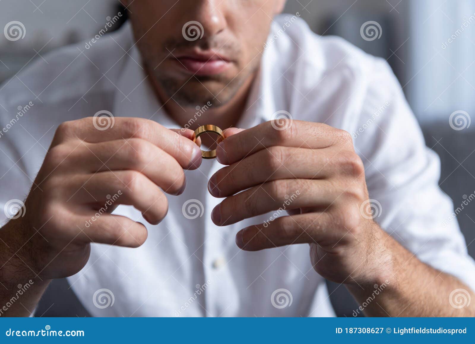 View of Man Holding Ring at Home Stock Image - Image of displeased ...