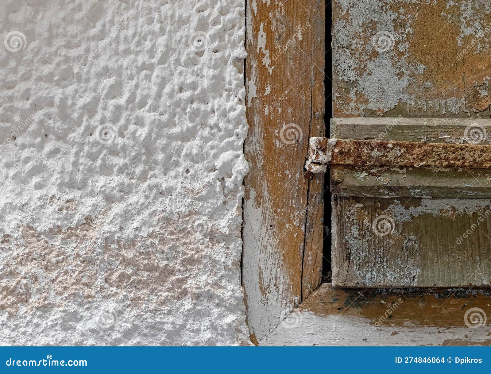 Partial View of Old Weathered Window Shutters and Rusty Hinge on a ...