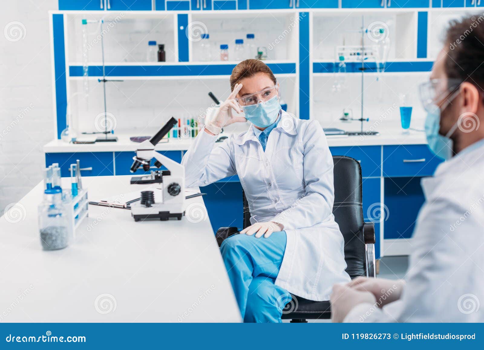 Partial View of Scientists Having Discussion at Workplace Stock Image ...