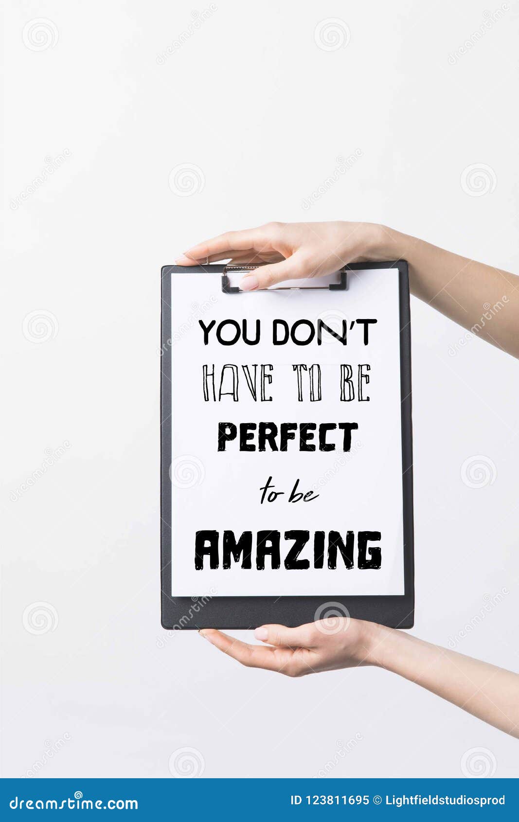 Partial View of Woman Holding Clipboard with You Dont Have To Be ... Partial View of Woman Holding Clipboard with You Dont Have To Be ...