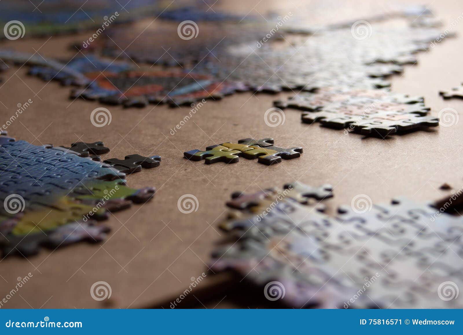 Partially Completed Puzzle on Table Stock Image - Image of puzzle ...