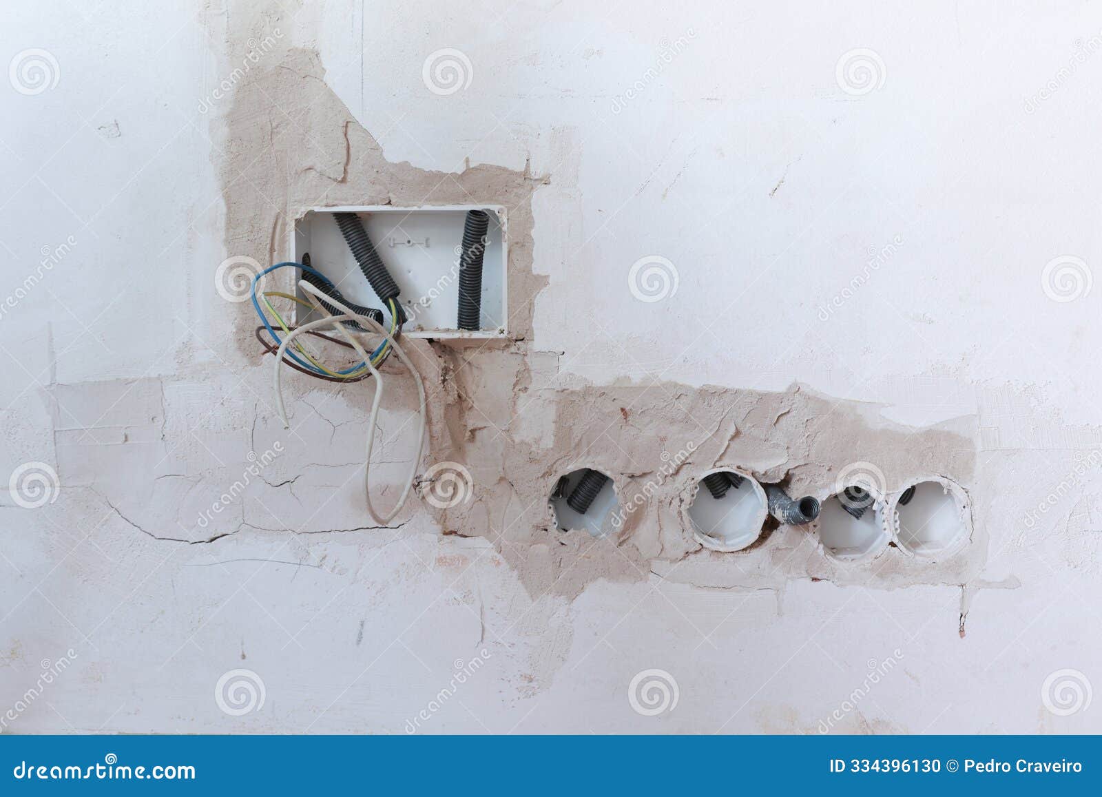 Partially Finished Wall with Exposed Electrical Wiring and Junction ...