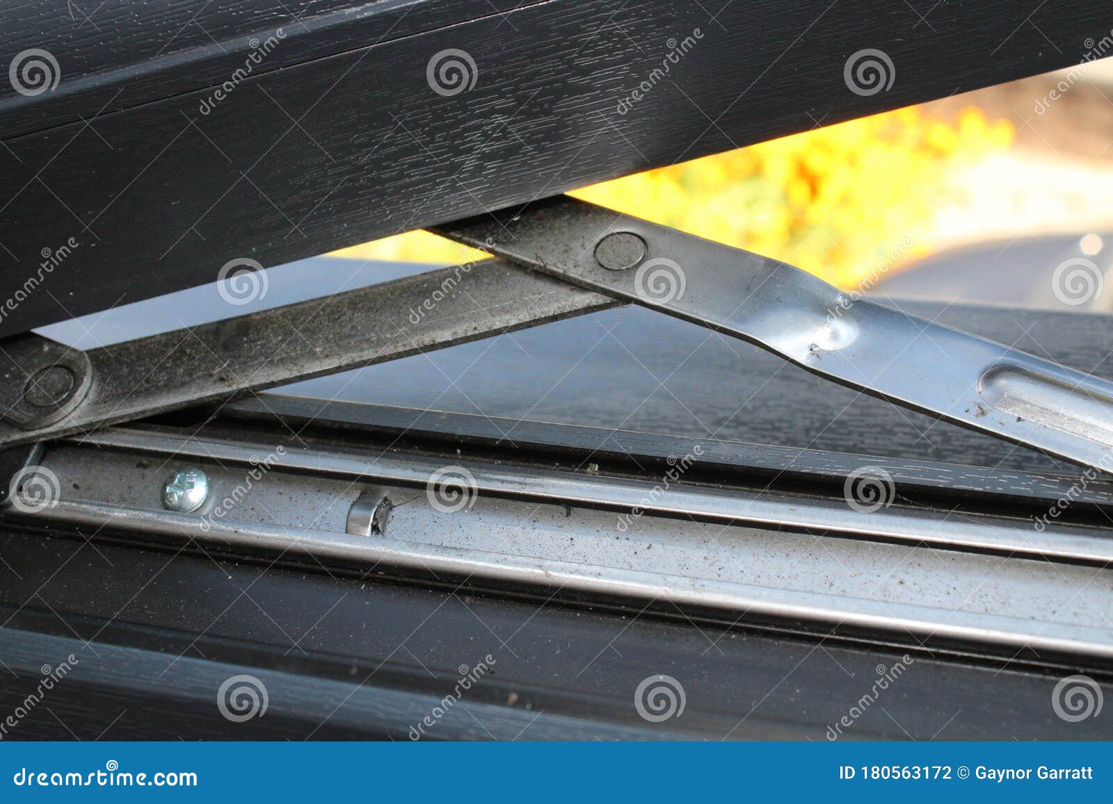 Window bracket mechanisms stock photo. Image of windows - 180563172