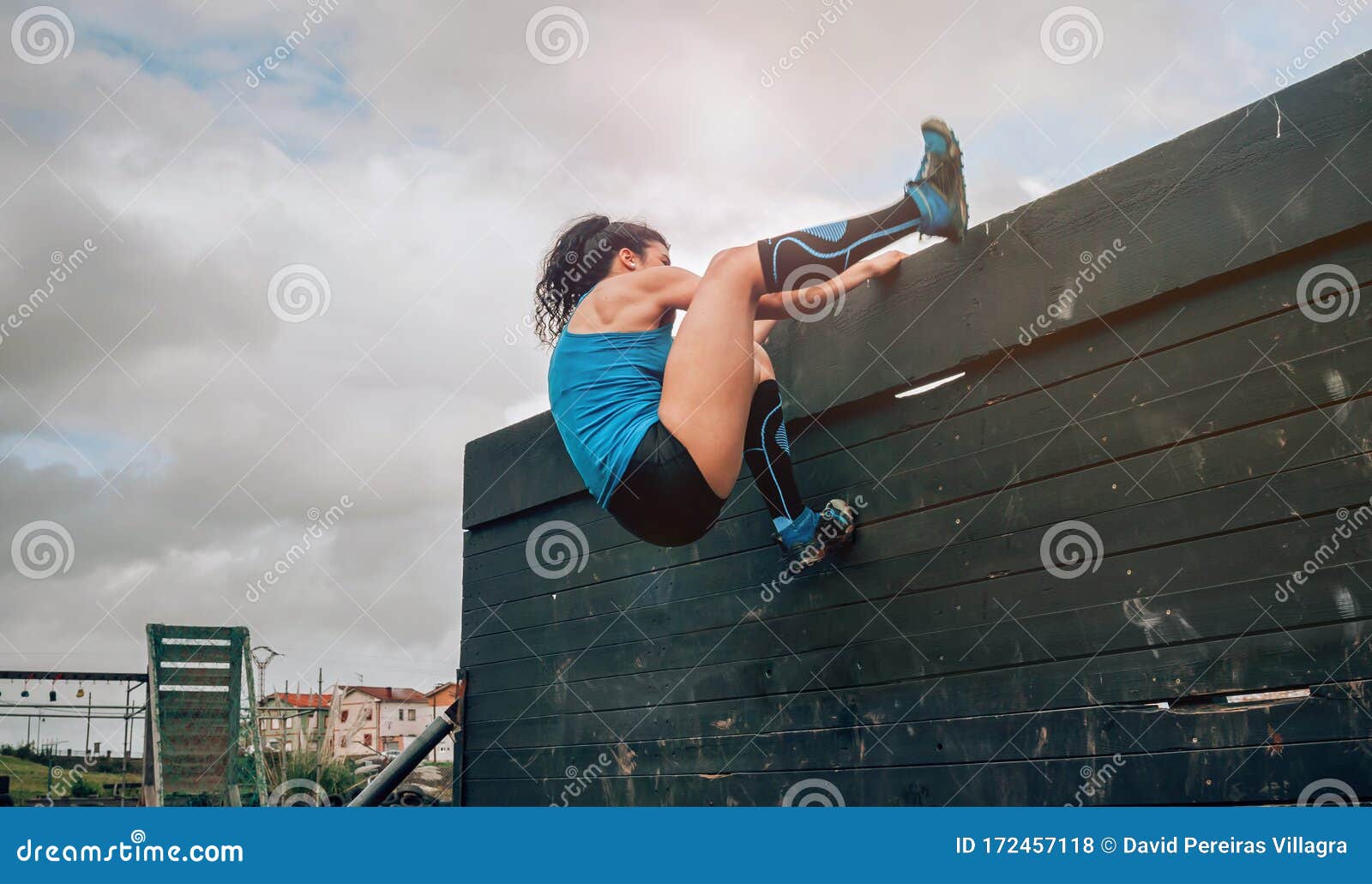 Participant in Obstacle Course Climbing Wall Stock Photo - Image of ...