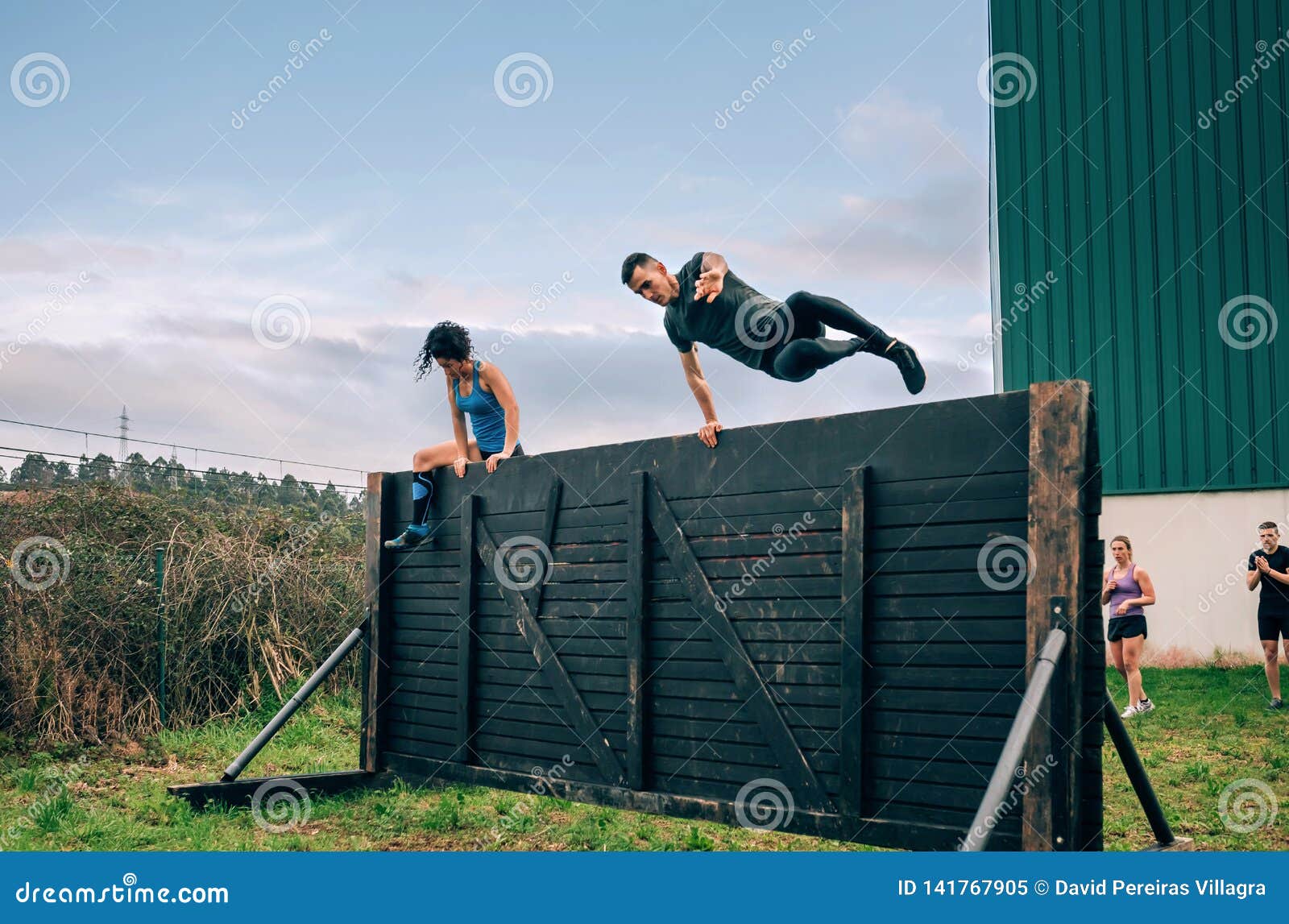 Participants in Obstacle Course Climbing Wall Stock Image - Image of ...