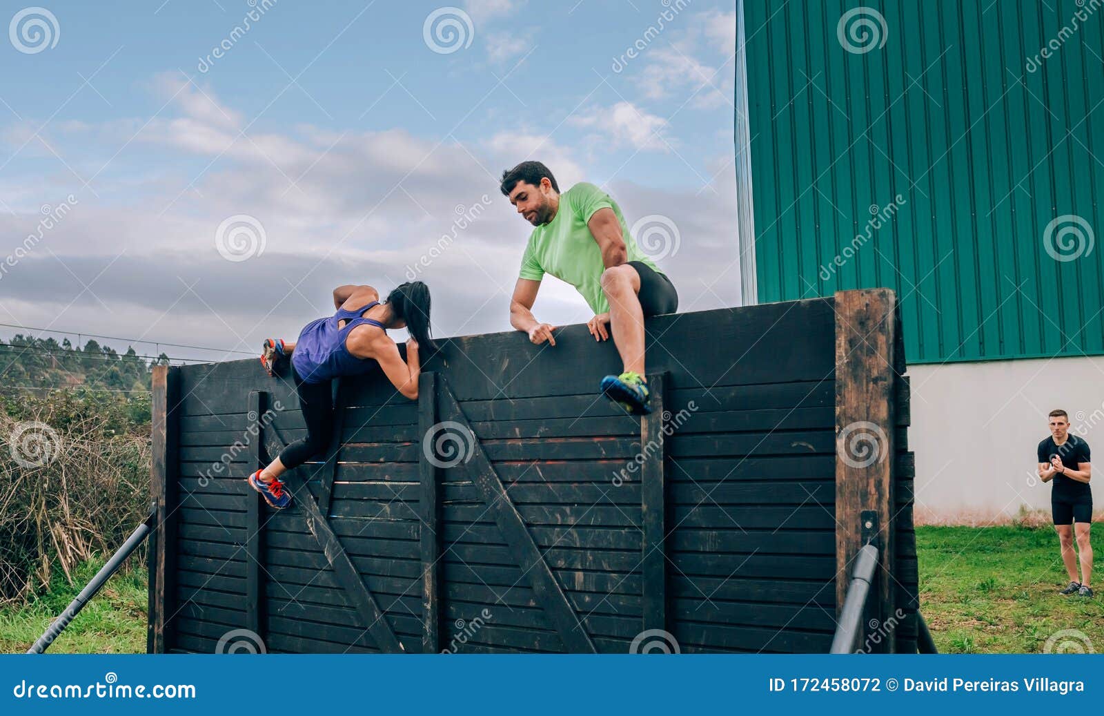 Participants in Obstacle Course Climbing Wall Stock Photo - Image of ...