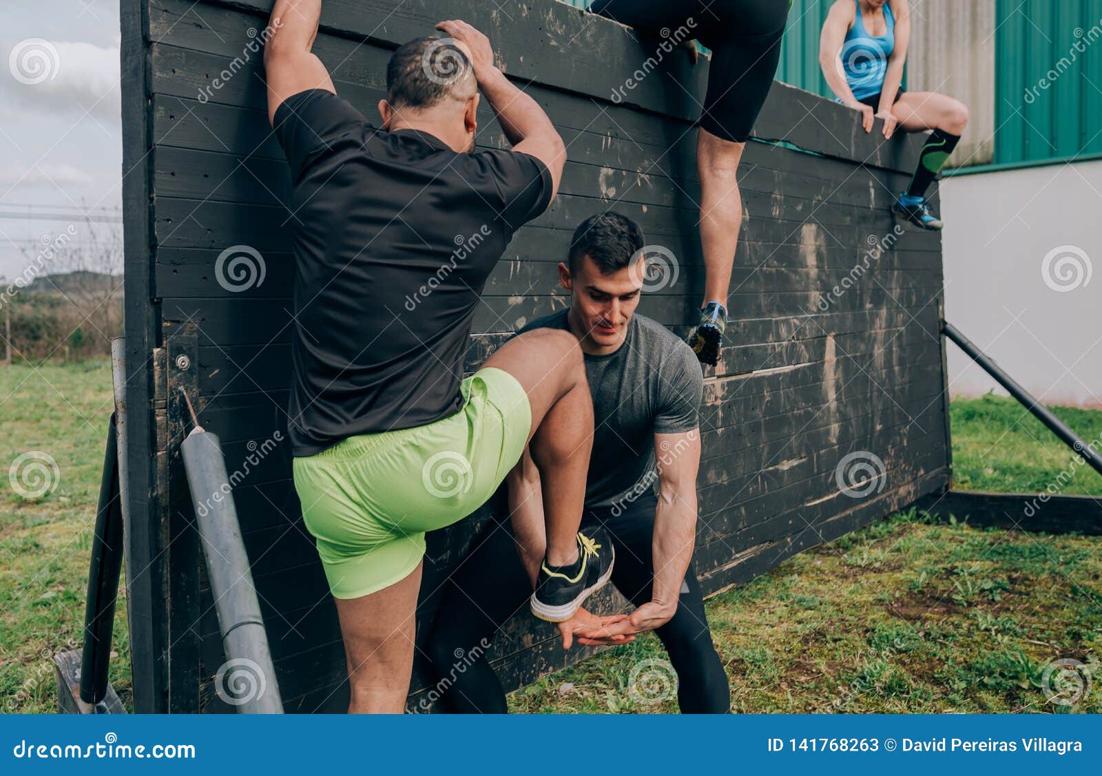Participants in Obstacle Course Climbing Wall Stock Image - Image of ...