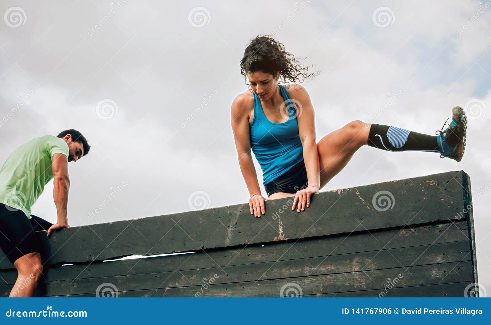 Participants in Obstacle Course Climbing Wall Stock Photo - Image of ...