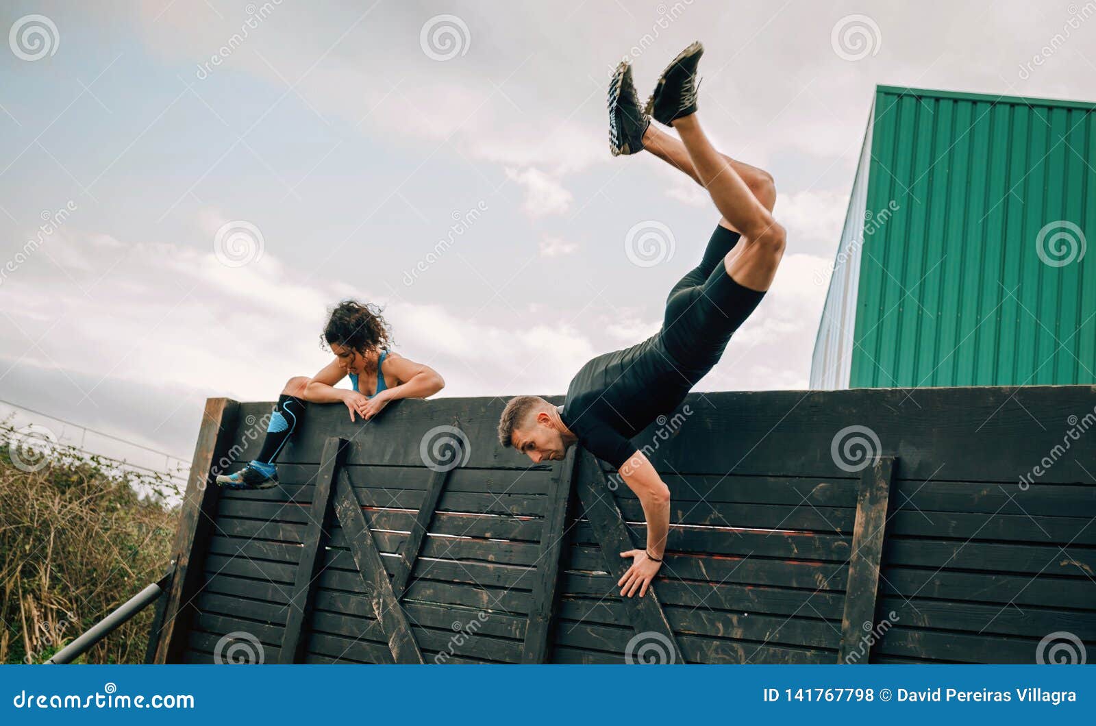 Participants in Obstacle Course Climbing Wall Stock Photo - Image of ...