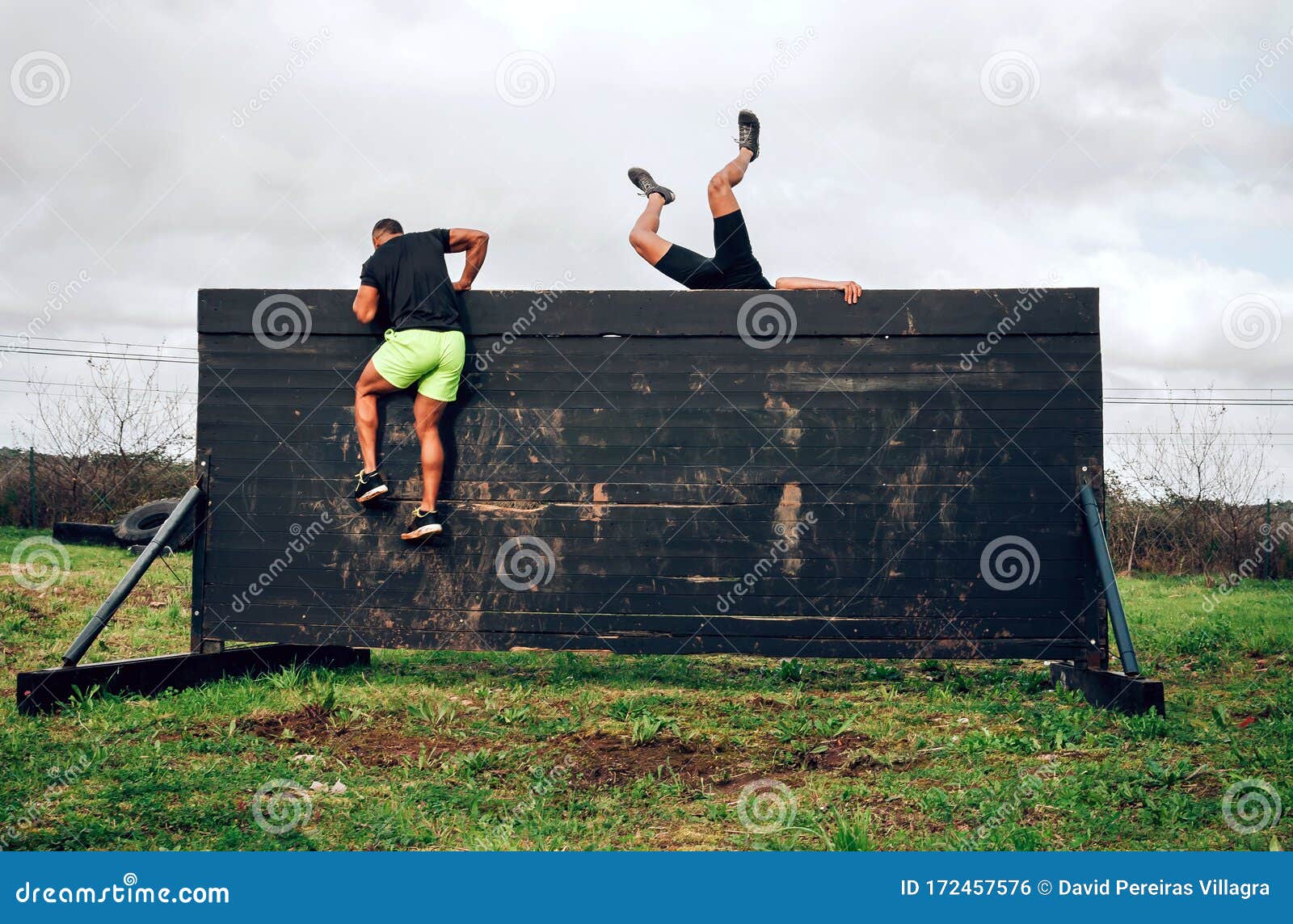 Participants in Obstacle Course Climbing Wall Stock Photo - Image of ...
