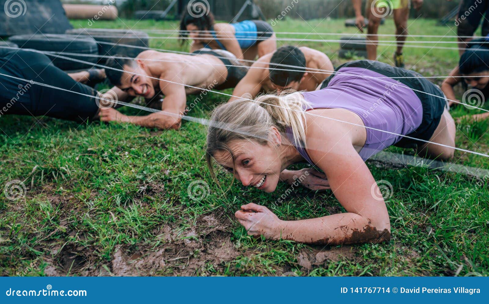Participants in an Obstacle Course Crawling Stock Photo - Image of ...