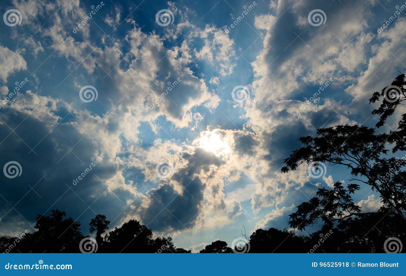 Partly cloudy blue sky stock photo. Image of blue, background - 96525918