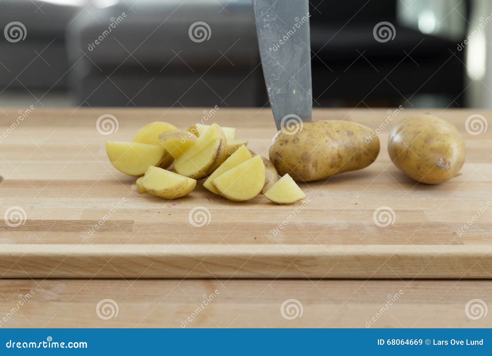 Partly cut potato stock image. Image of board, cutting - 68064669