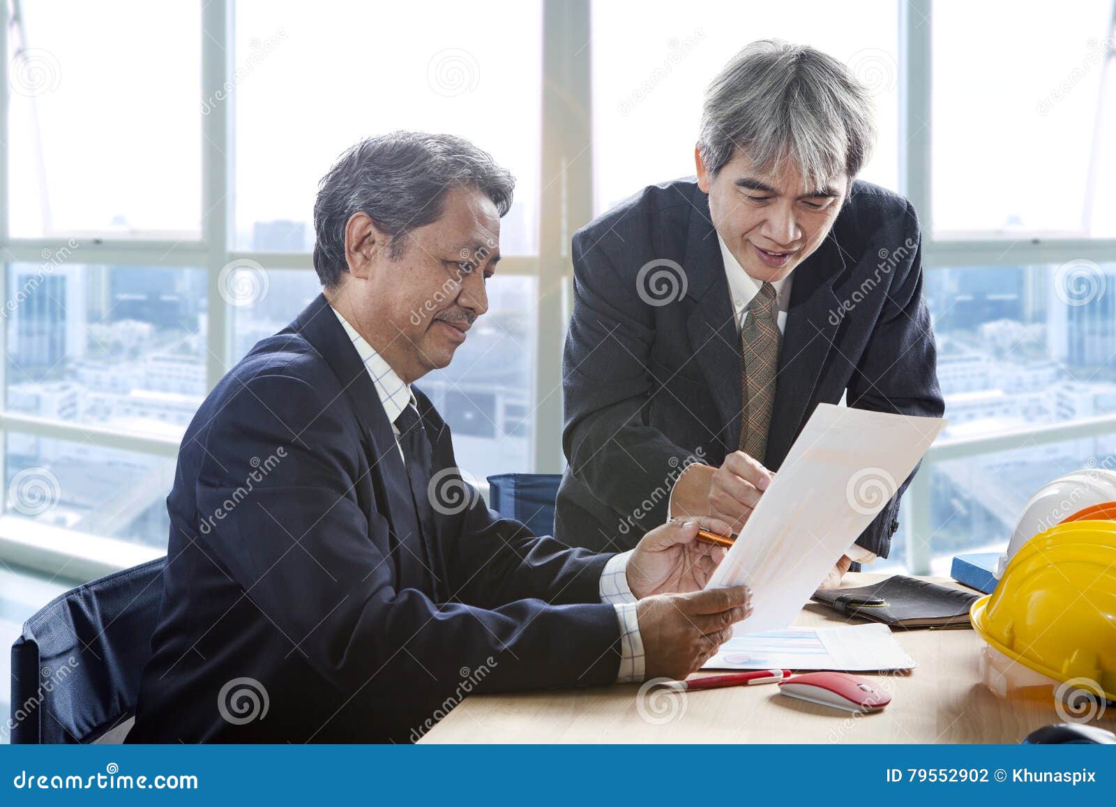 Partner of Senior Engineering Working Man Serious Meeting about Stock ...