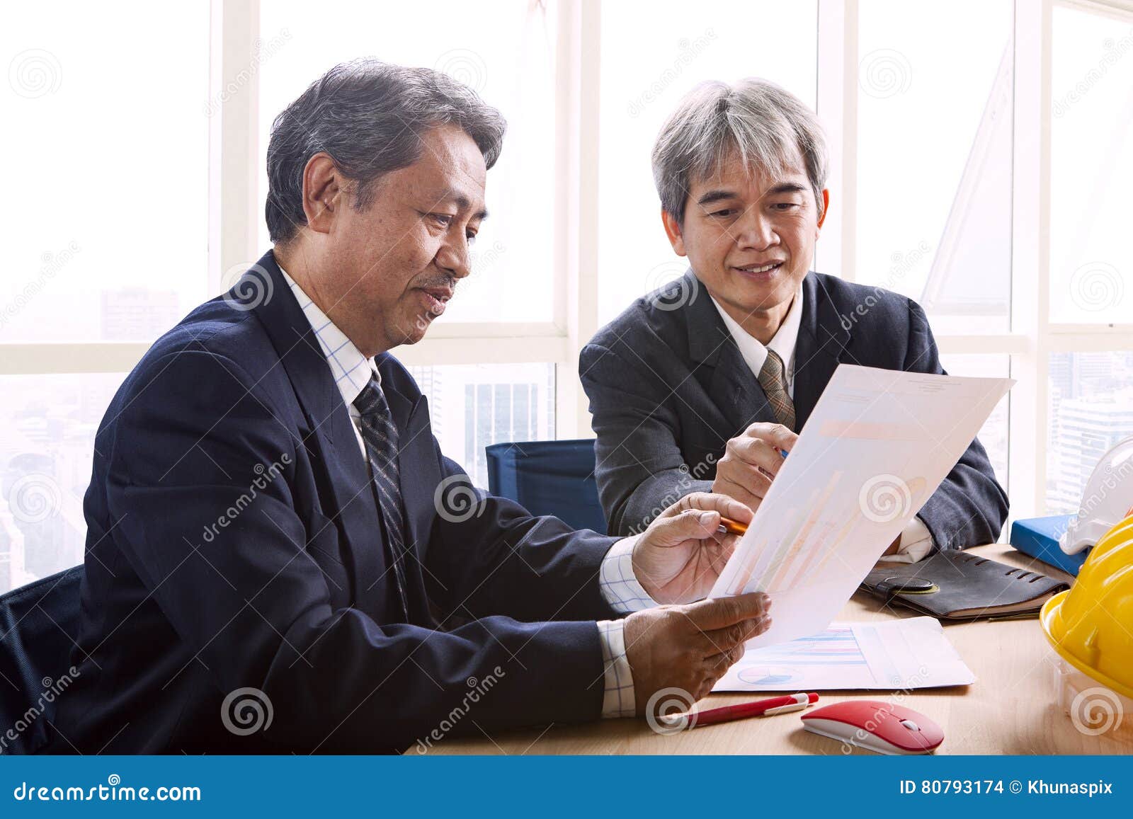 Partner of Senior Engineering Working Man Serious Meeting about Stock ...