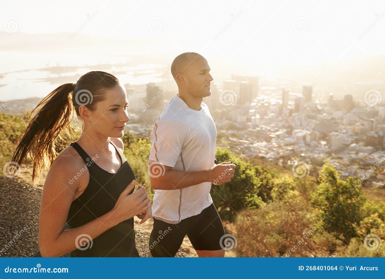 Partners in Exercise. a Young Couple Out Running Together. Stock Photo ...