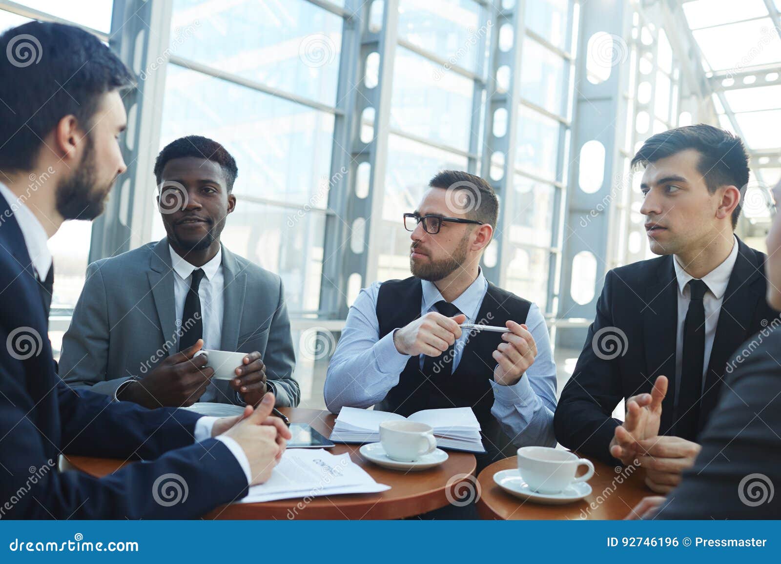 Partners negotiating stock photo. Image of colleague - 92746196