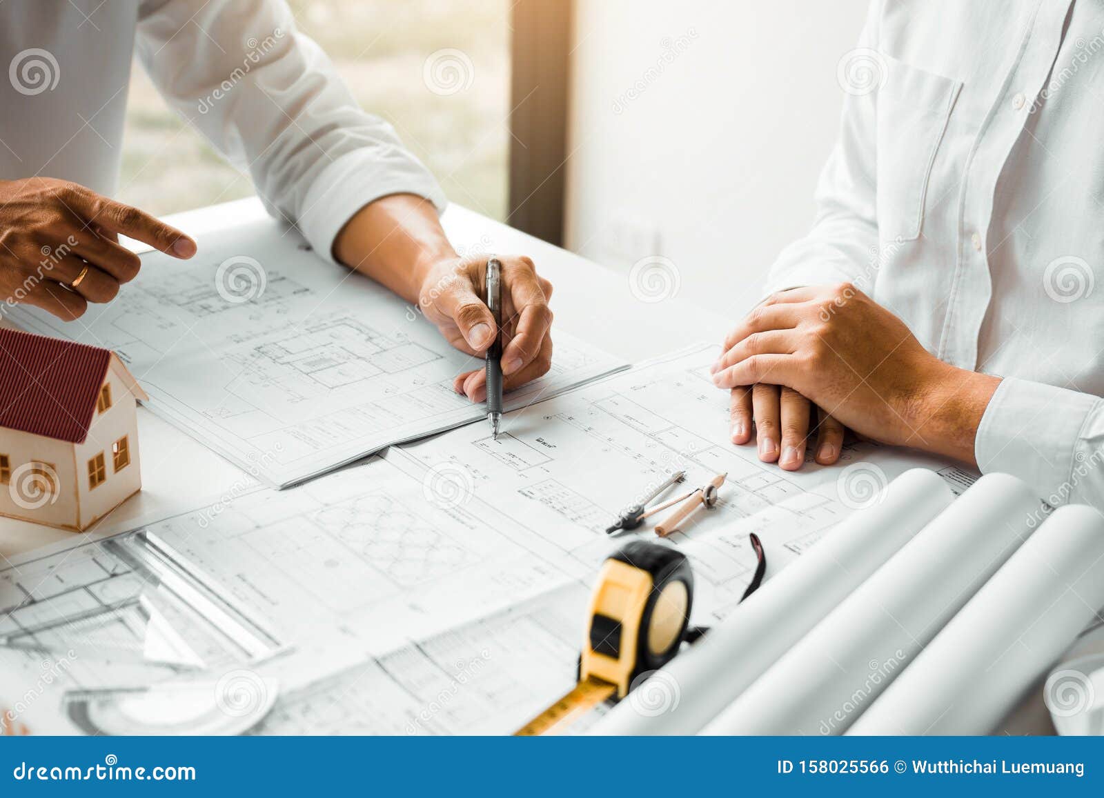 The Partnership Engineering Man or Co-workers Working on a Project and ...