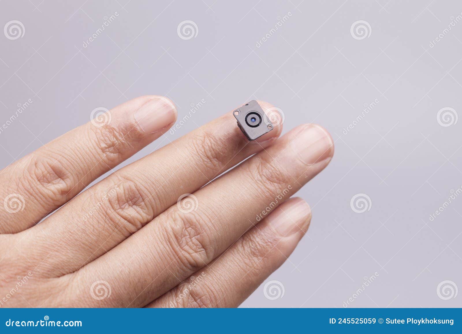 Parts of the Digital Camera Compared To the Size of the Fingernails ...
