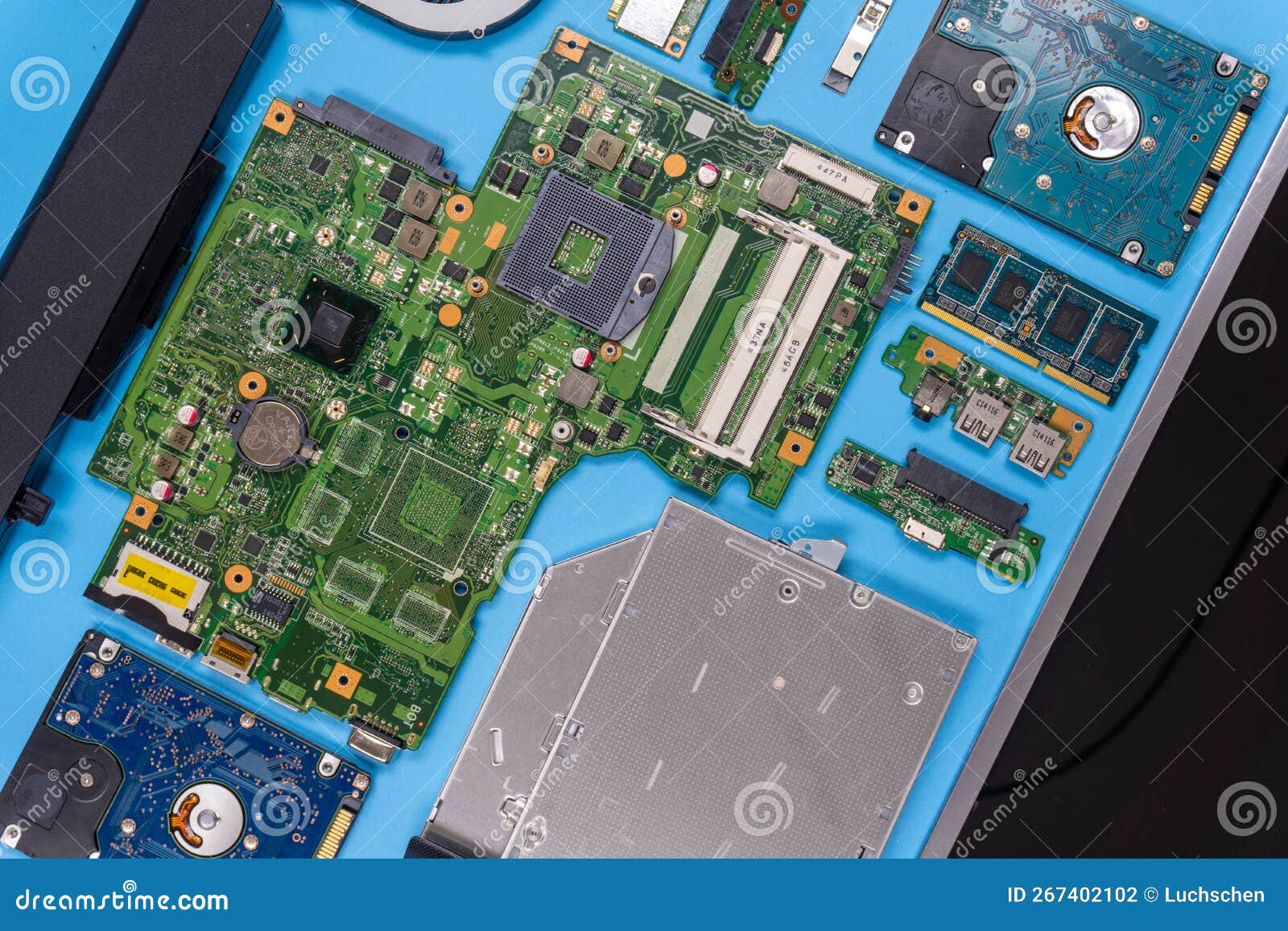 Parts of a Modern Computer. the Insides of a Laptop on a Blue ...