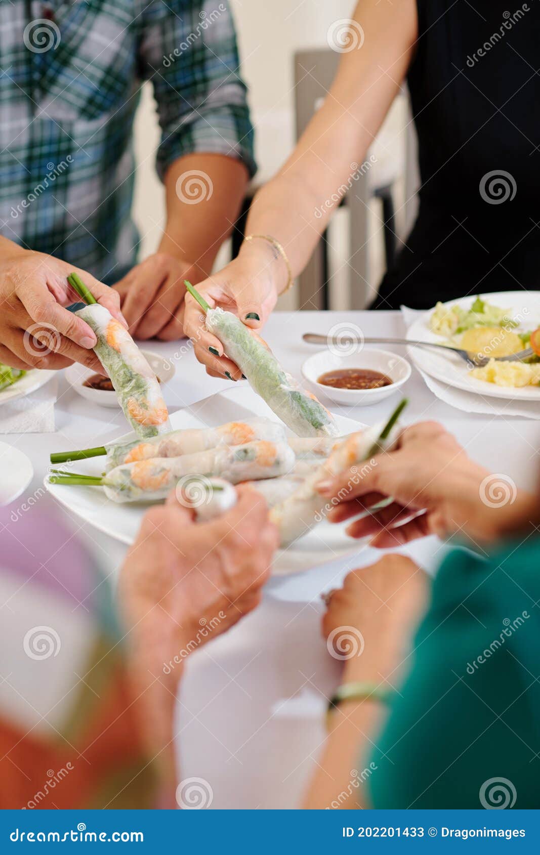 Party eating spring rolls stock image. Image of freshness - 202201433