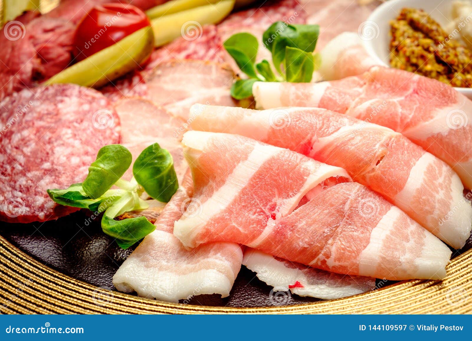 Party Platter of Assorted Cured Meats with Sauce and Pickles Stock ...