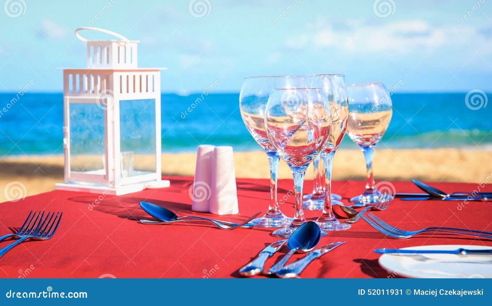Party table on the beach stock image. Image of glass - 52011931