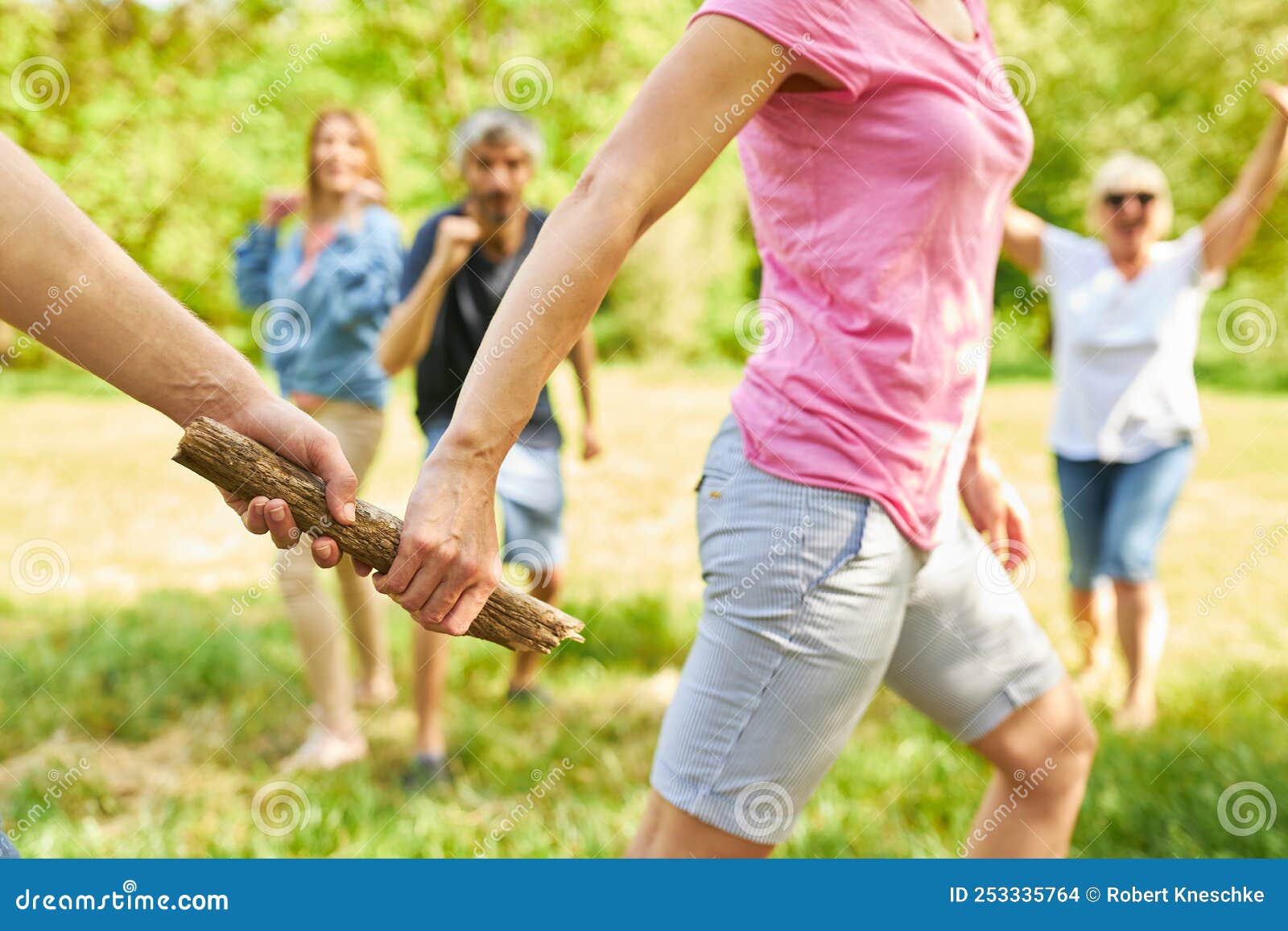 Pass Hands and Take the Baton Stock Photo - Image of group, outside ...